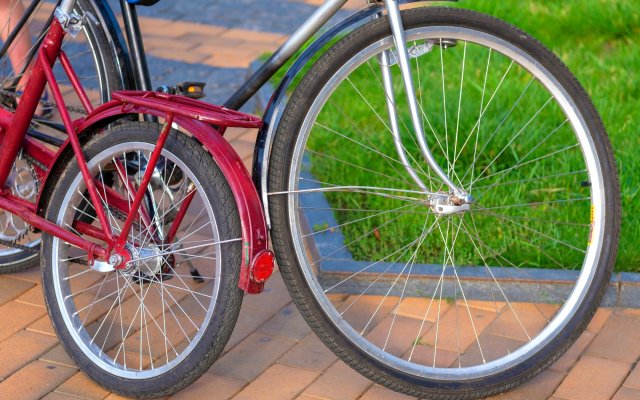 Why is it better to ride a bike on the road with bigger wheels than with smaller ones? - Physics ...